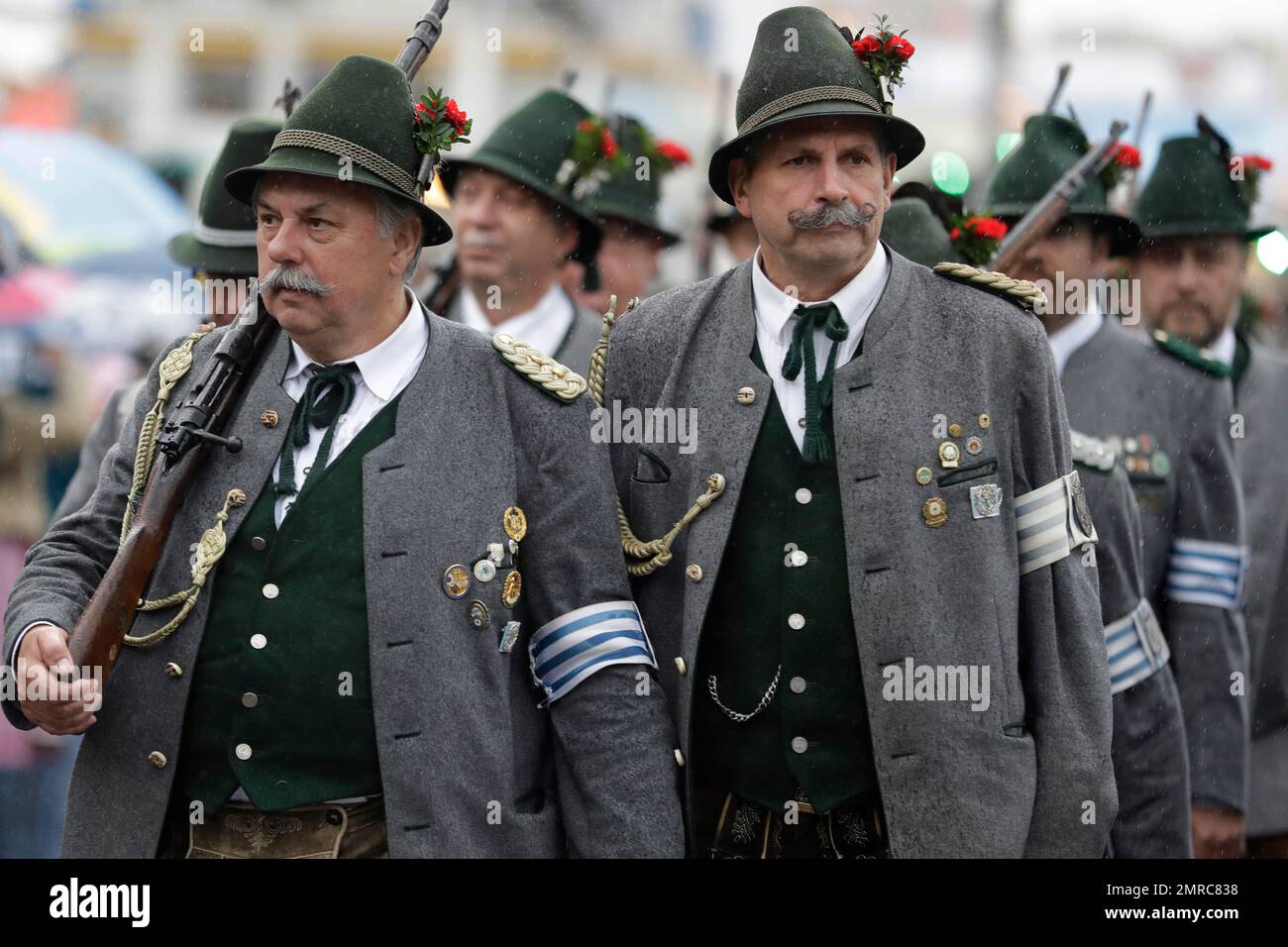 Bavarian riflemen in traditional costumes arrive for a salute shooting ...