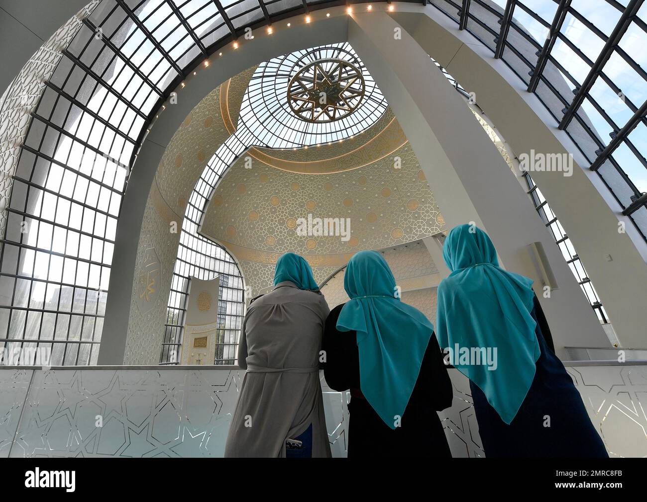 Visitors stand in the new central DITIB mosque on the "Day of Open ...