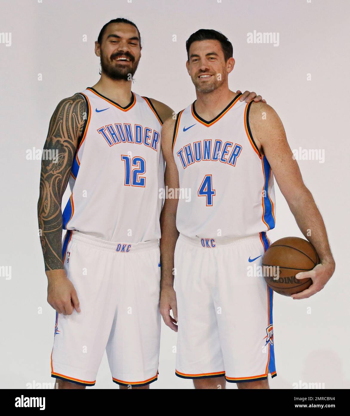 Oklahoma City Thunder's Steven Adams (12) and Nick Collison (4) pose ...