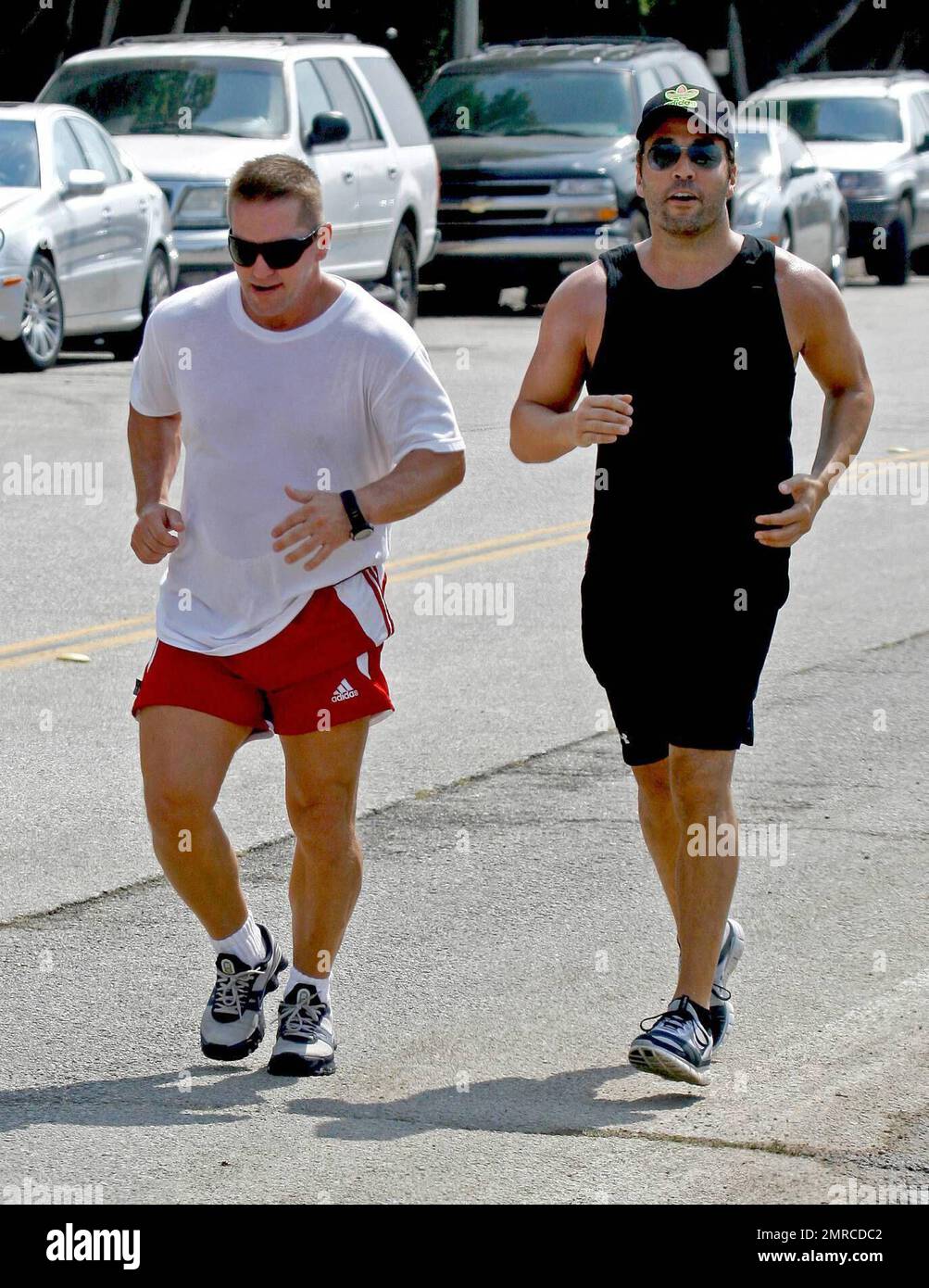 Exclusive!! Jeremy Piven takes a morning jog with a very buff friend ...