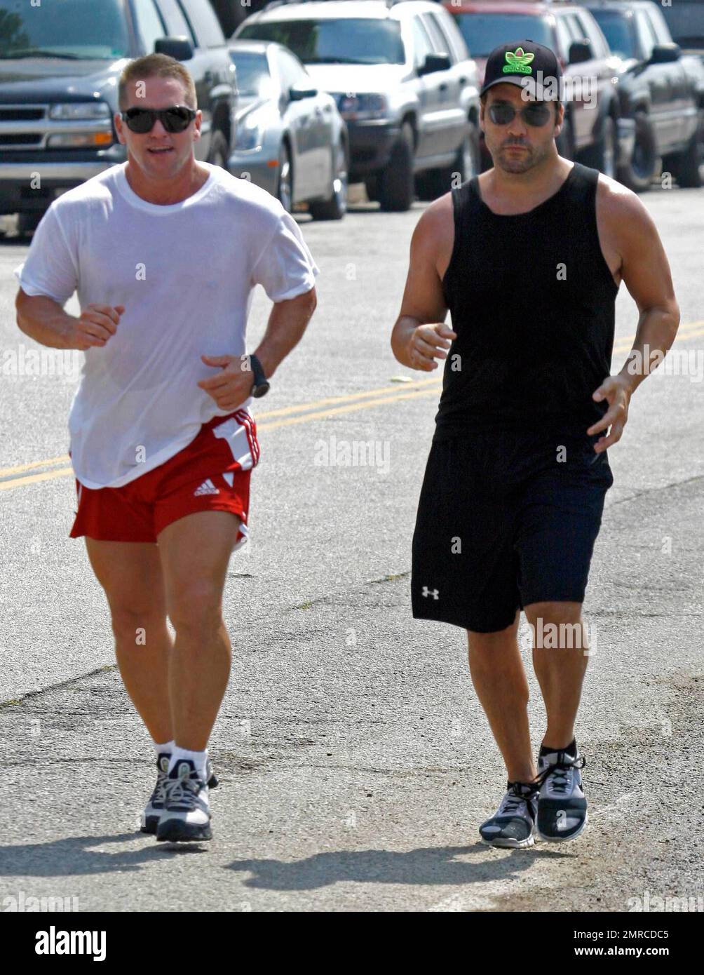 Exclusive!! Jeremy Piven takes a morning jog with a very buff friend ...