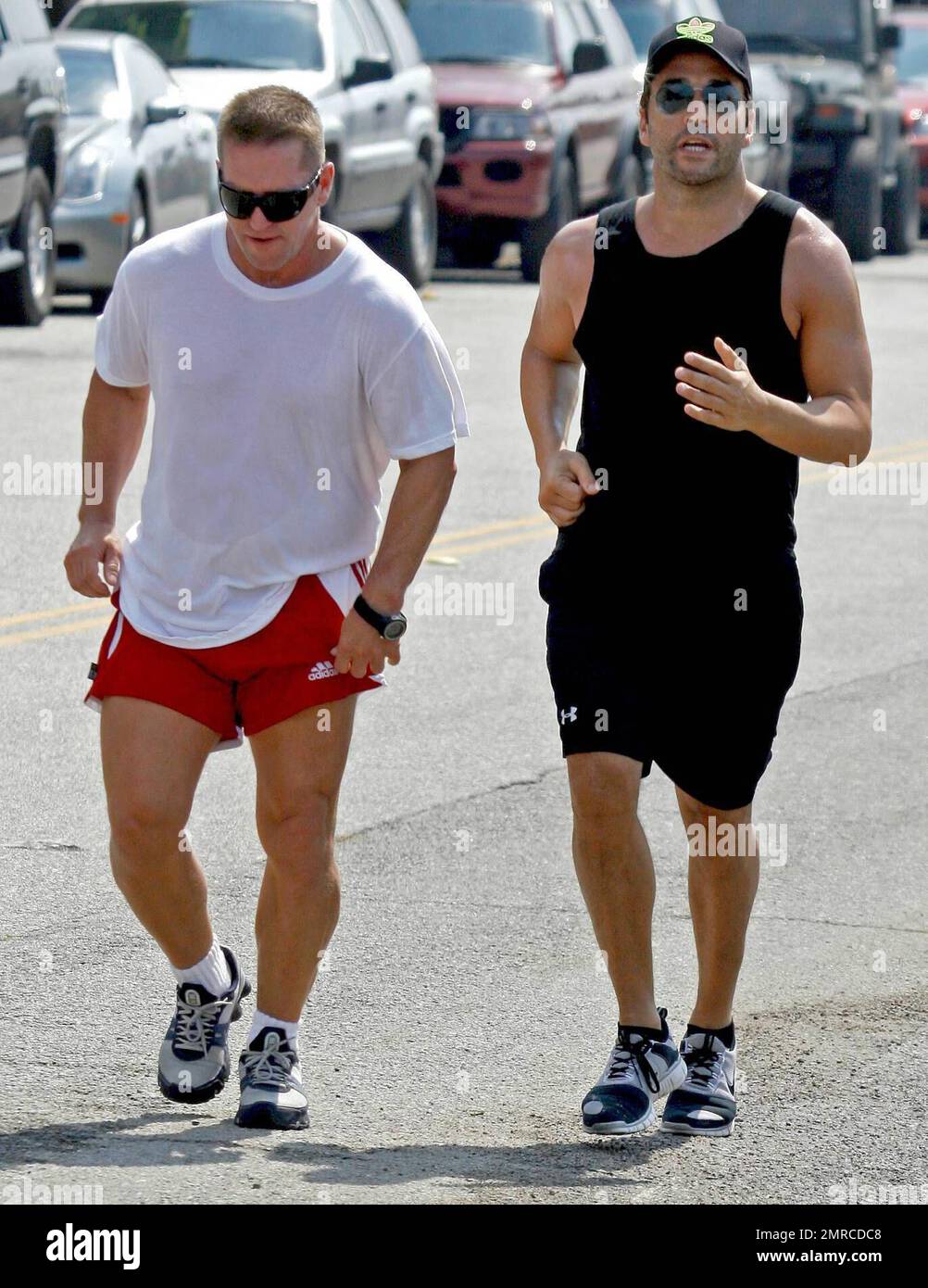Exclusive!! Jeremy Piven takes a morning jog with a very buff friend ...