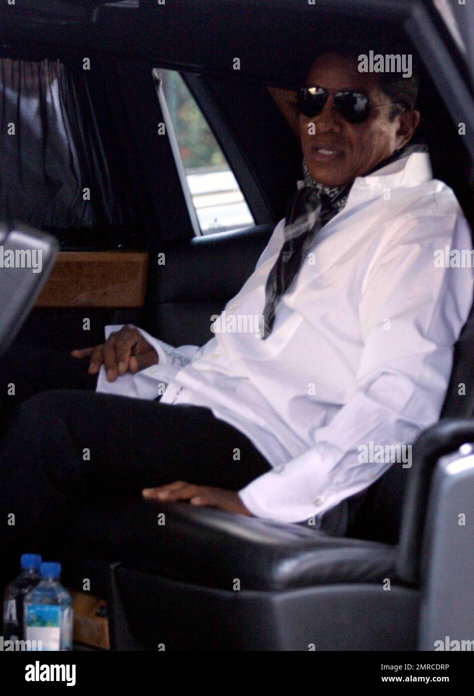 Michael Jackson's brothers Jermaine and Jackie Jackson are all smiles ...