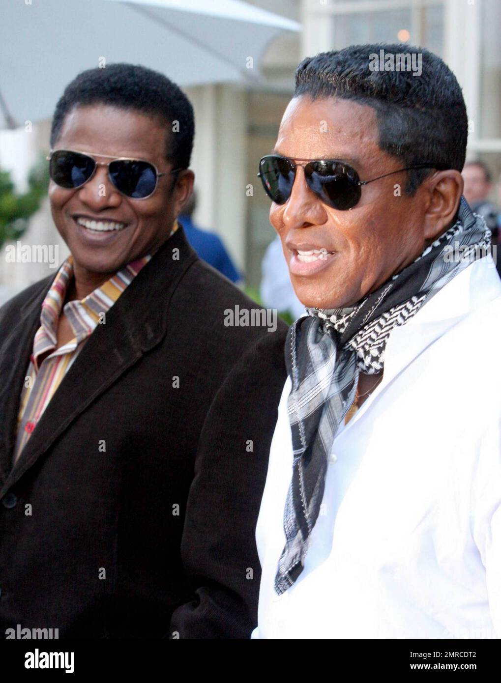 Michael Jackson's brothers Jermaine and Jackie Jackson are all smiles ...