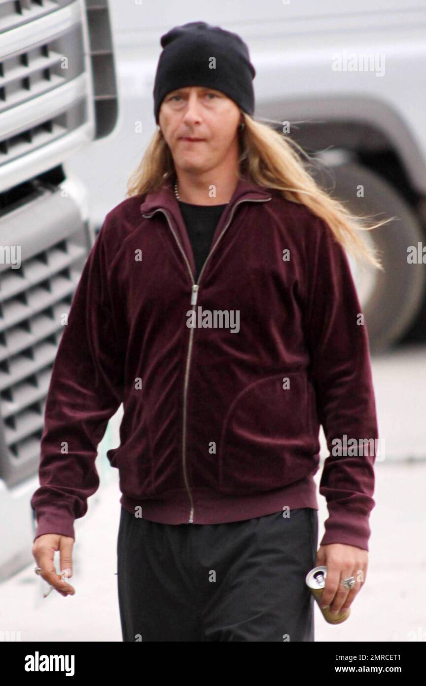 American guitarist Jerry Cantrell of Alice in Chains smokes a cigarette ...