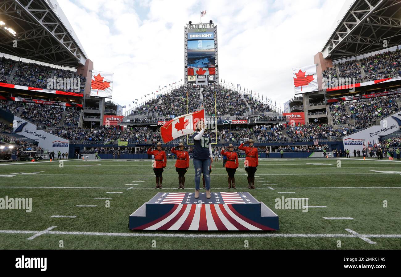 Arielle Tuliao sings the Canadian national anthem at CenturyLink Field ...