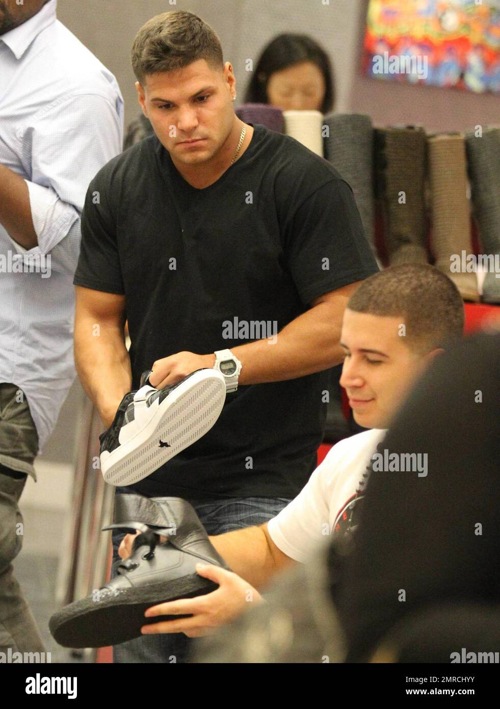 Ronnie Ortiz-Magro and Vinny Guadagnino of the hit MTV reality show "Jersey Shore" mills about ...