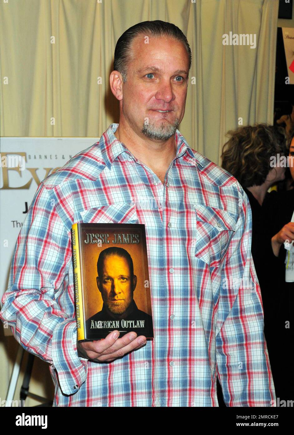 Jesse James signs copies of his new book "American Outlaw" at Barnes ...