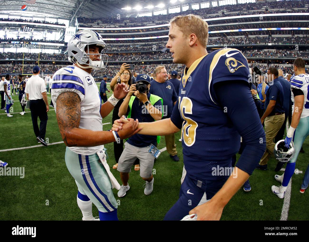Dallas Cowboys' Dak Prescott, left, and Los Angeles Rams' Jared Goff ...