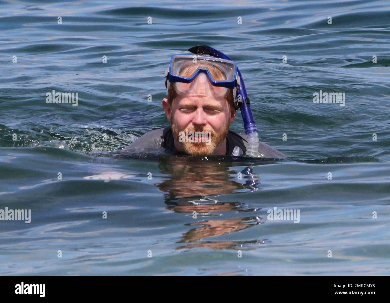 "Modern Family" star Jesse Tyler Ferguson enjoys a day out at the beach ...