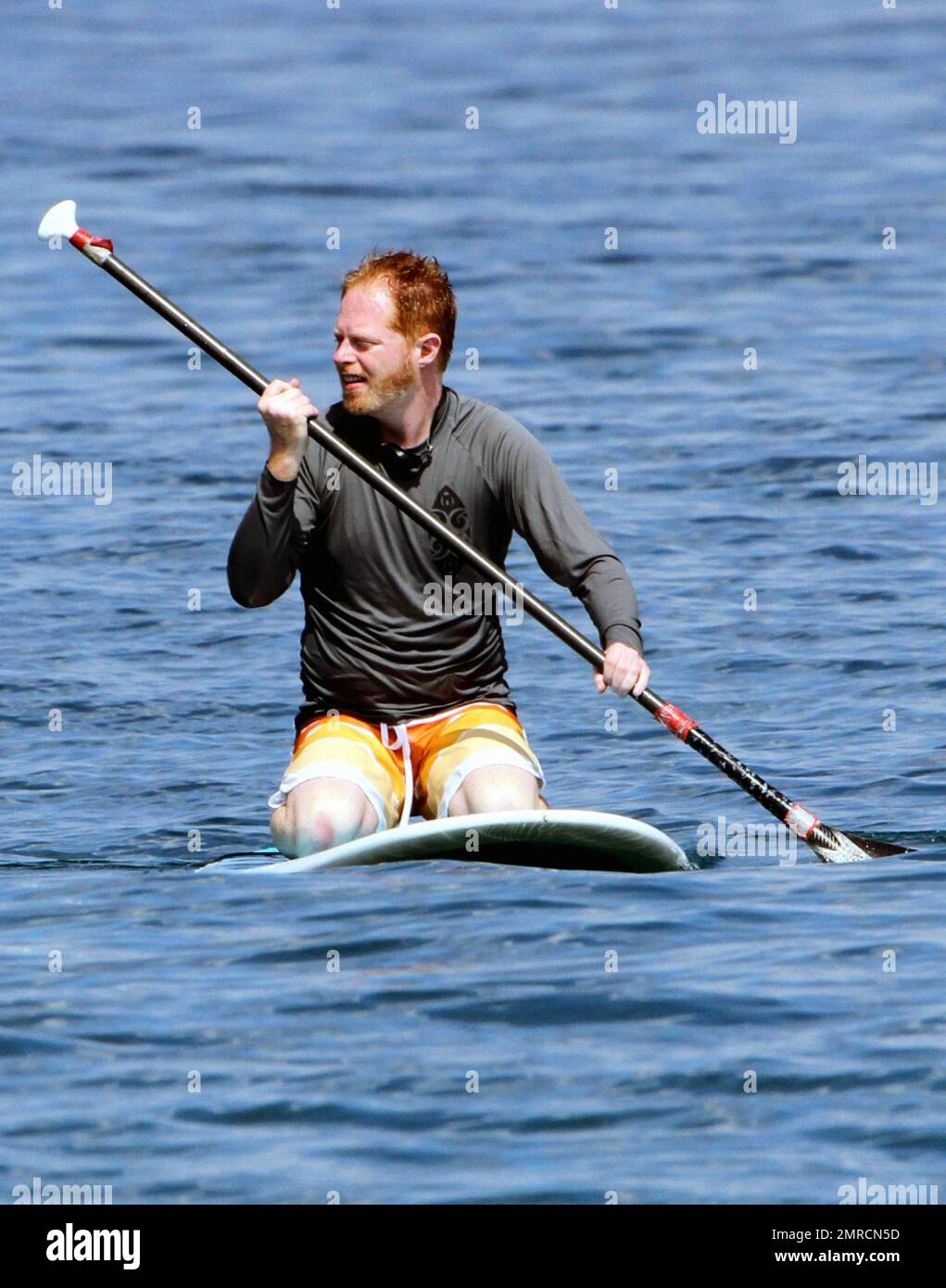 "Modern Family" star Jesse Tyler Ferguson enjoys a day out at the beach ...