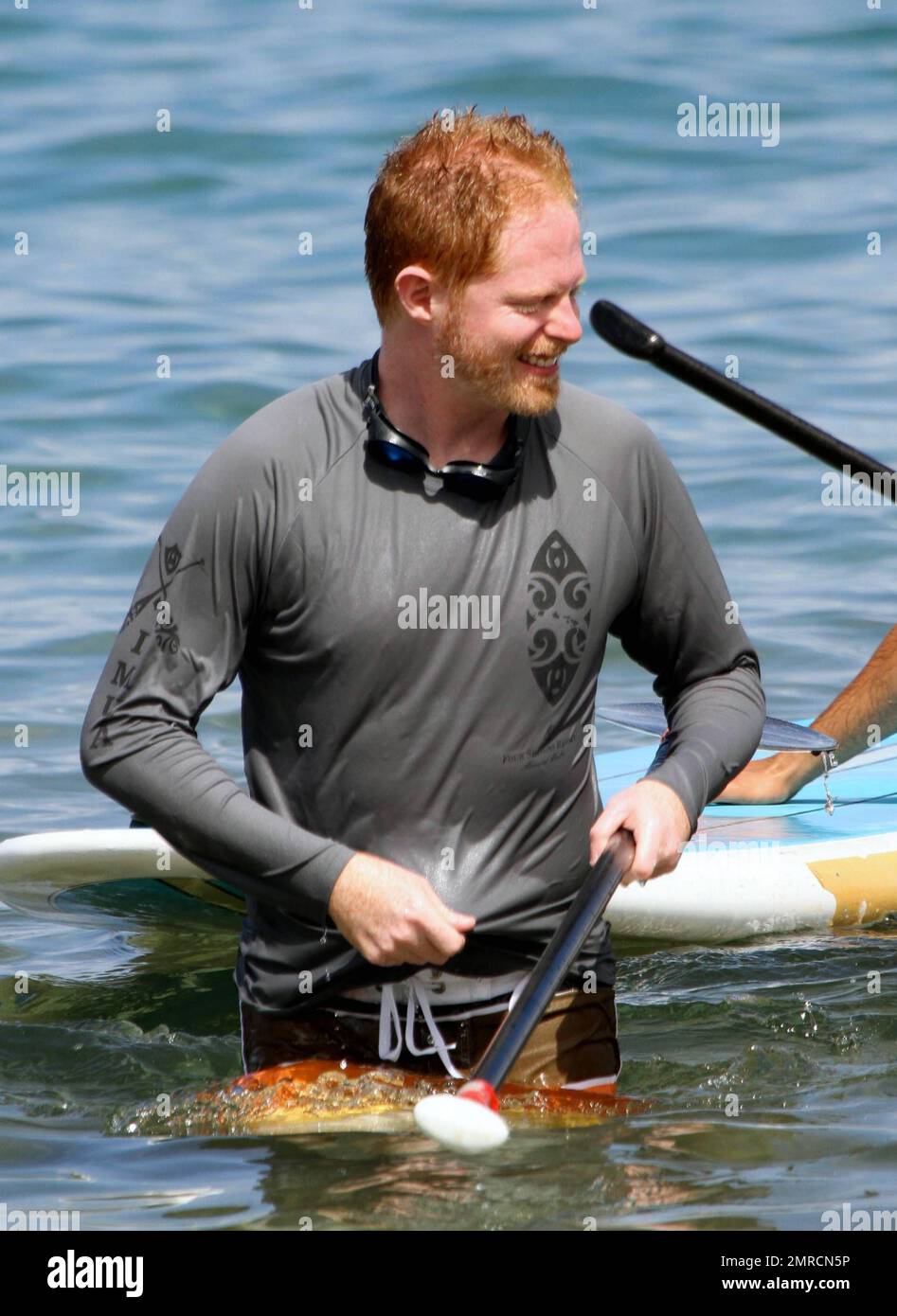 "Modern Family" star Jesse Tyler Ferguson enjoys a day out at the beach ...