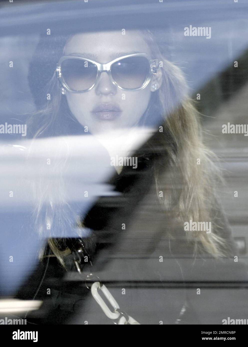 Jessica Alba and her boyfriend Cash Warren get in a cab outside their ...