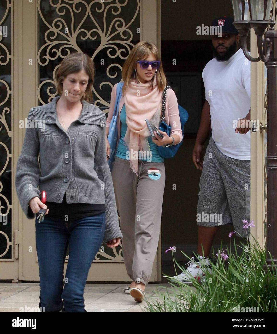 Jessica Alba sports some cool purple shades as she leaves a property in ...