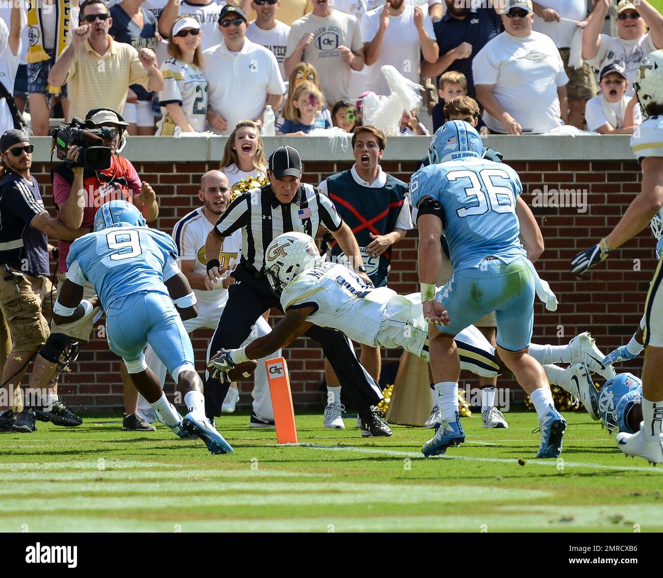 CORRECTION: Georgia Tech quarterback TaQuon Marshall (16) dives into ...
