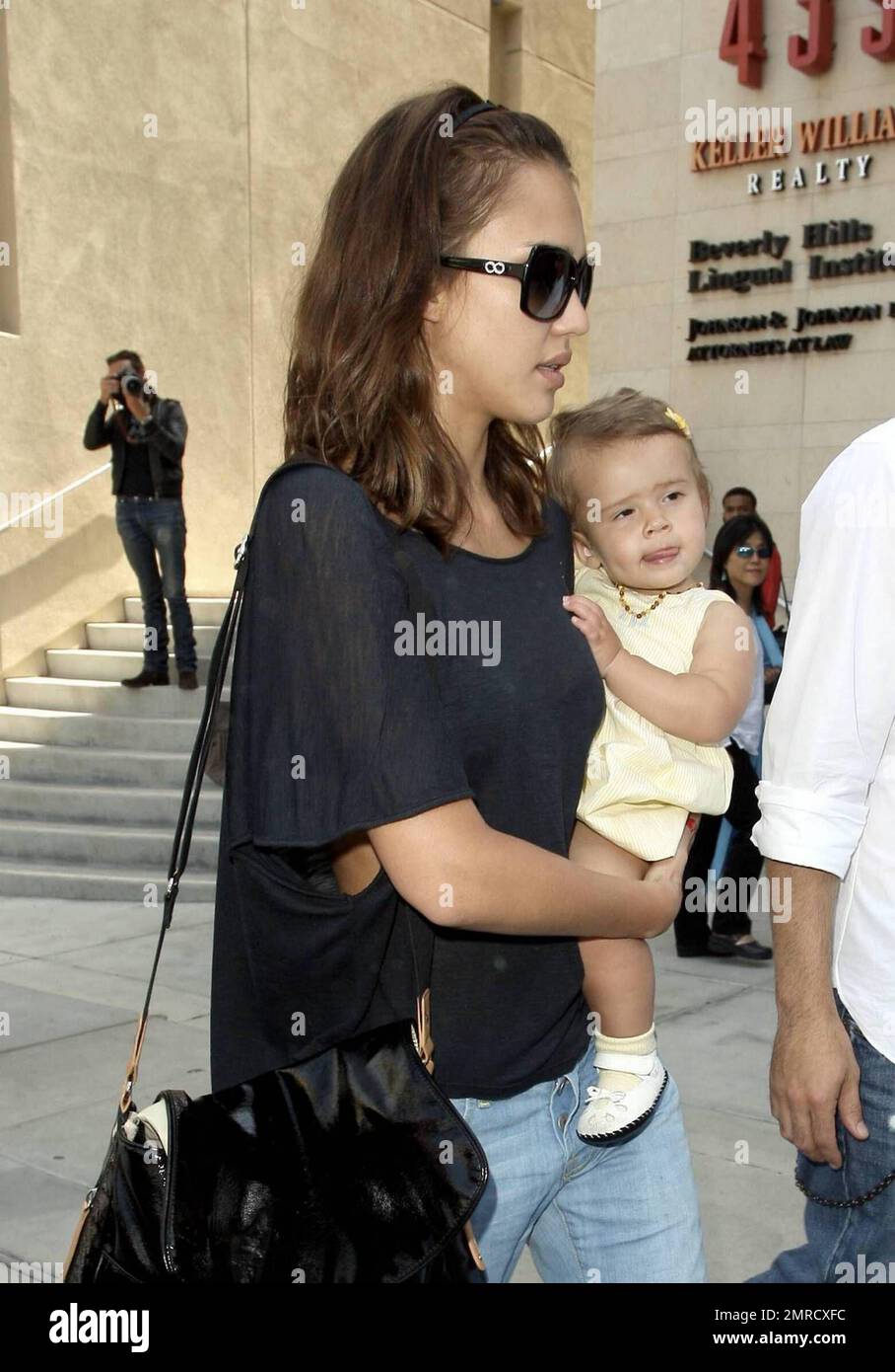 Jessica Alba carries her daughter Honor Marie Warren as she strolls in ...
