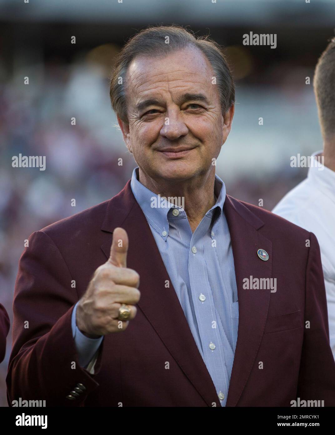 Texas A&M Chancellor John Sharp gives a Gig'Em before to the crowd at ...