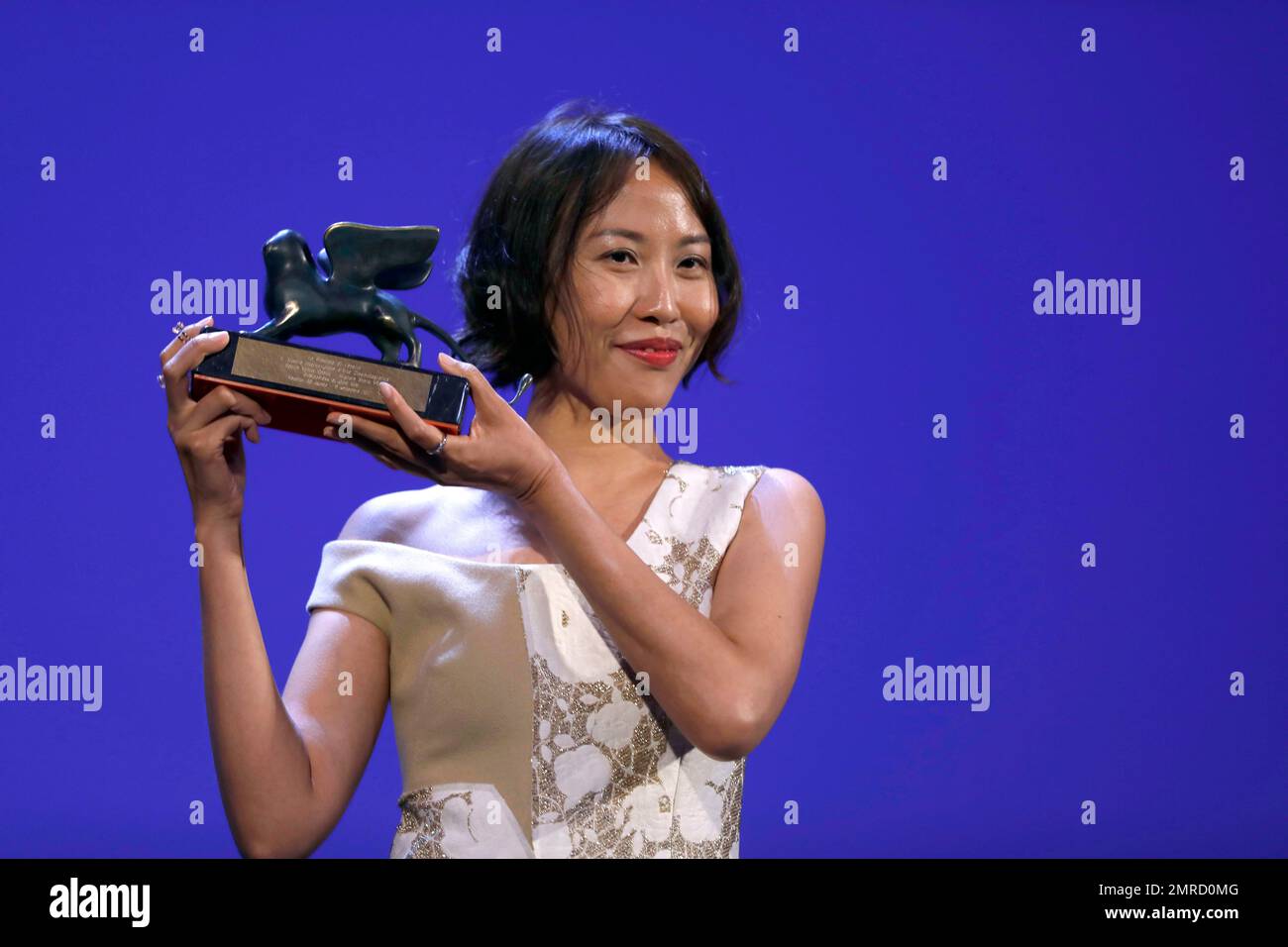 FILE - In this Sept. 9, 2017 file photo, Gina Kim holds the Venice ...