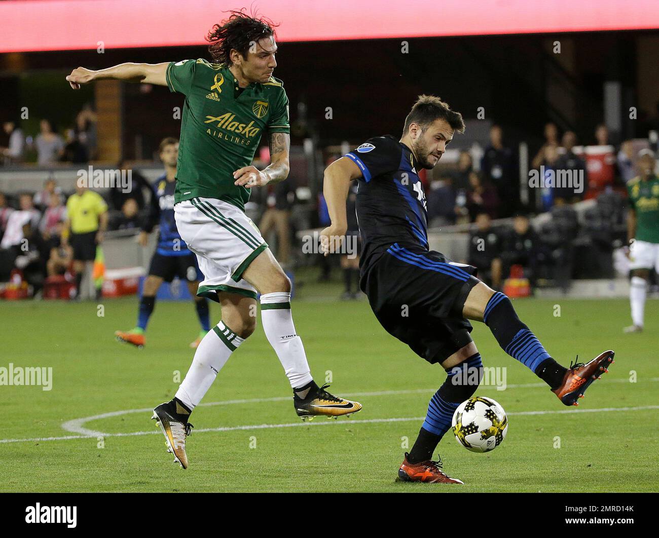 San Jose Earthquakes forward Vako Qazaishvili, right, tries to control ...