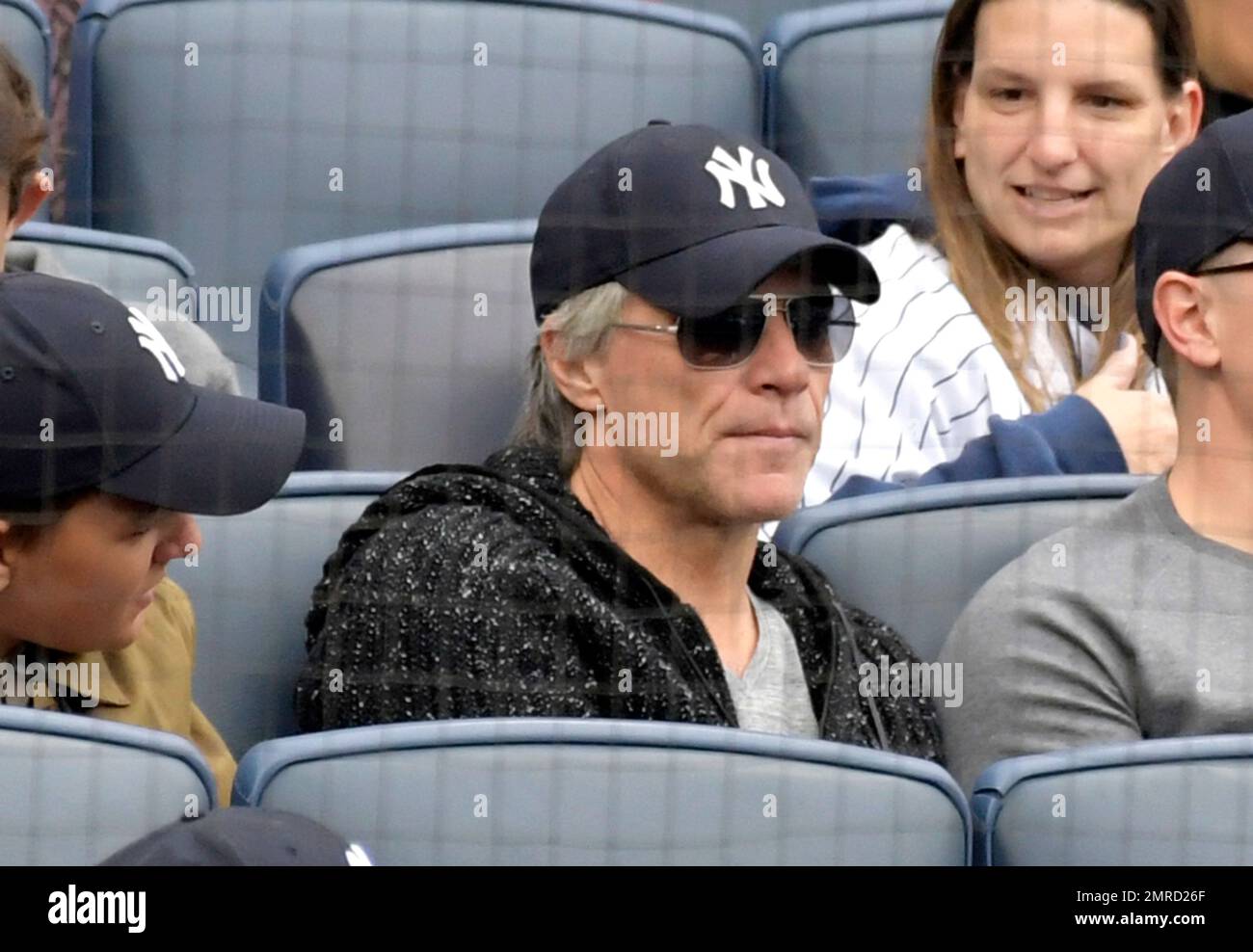 Singer Jon Bon Jovi watches the New York Yankees and Toronto Blue Jays ...