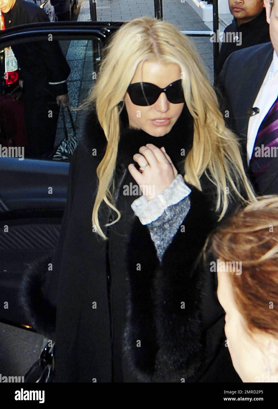 Singer Jessica Simpson, who showed off her large diamond engagement ...