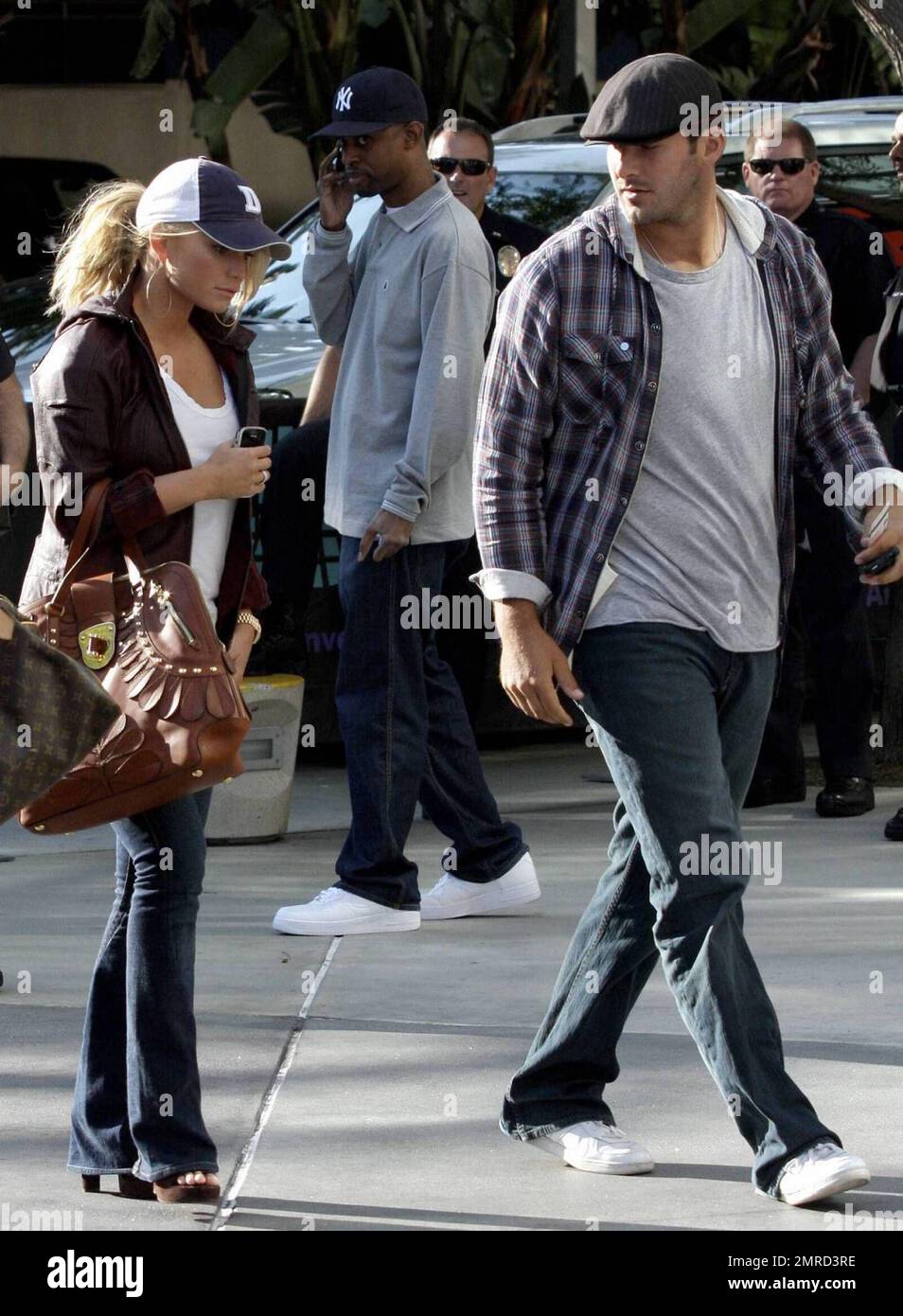 Jessica Simpson covers up her long blonde locks with a baseball cap as ...