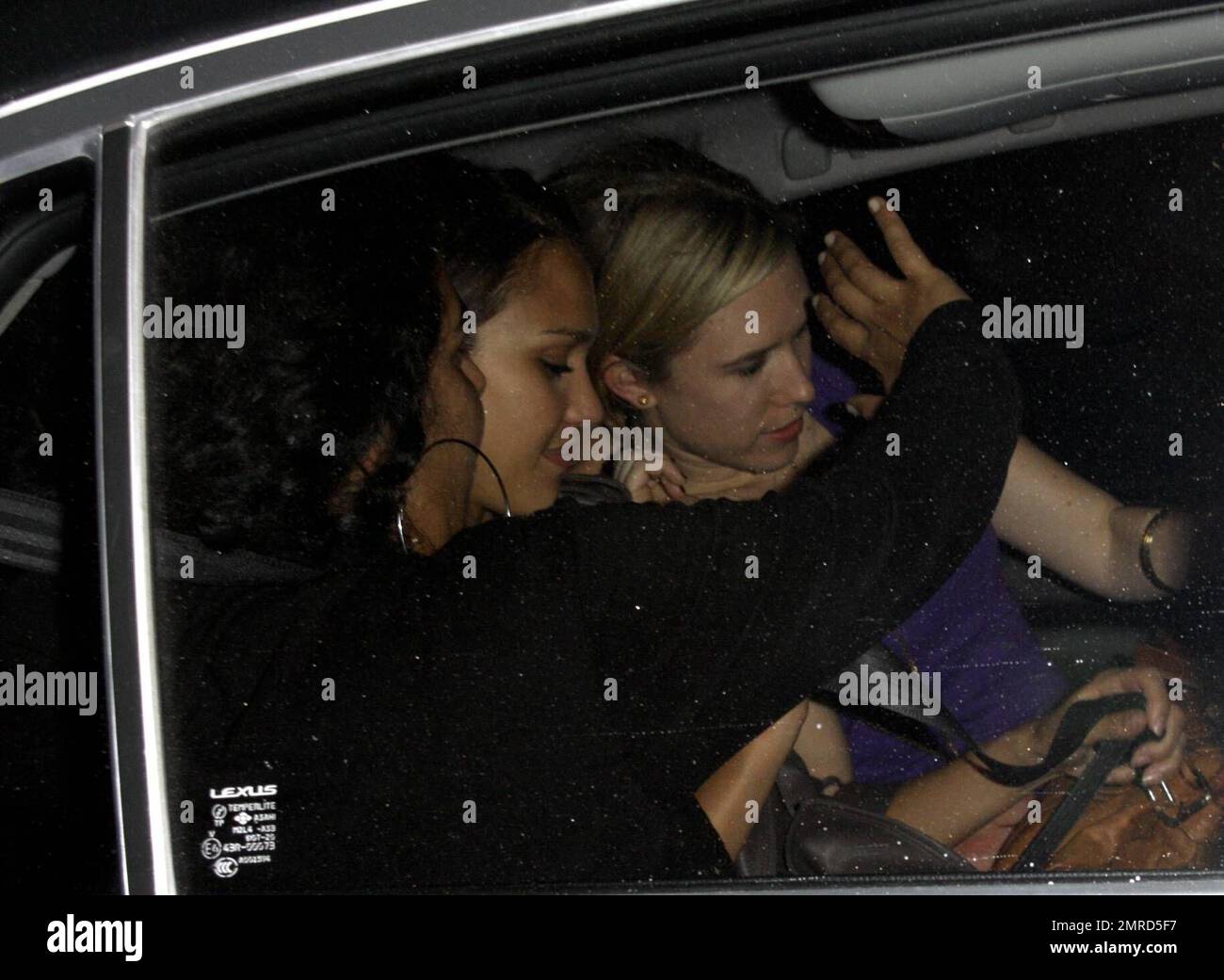 Jessica Alba is packed into a car with friends outside the nightclub ...