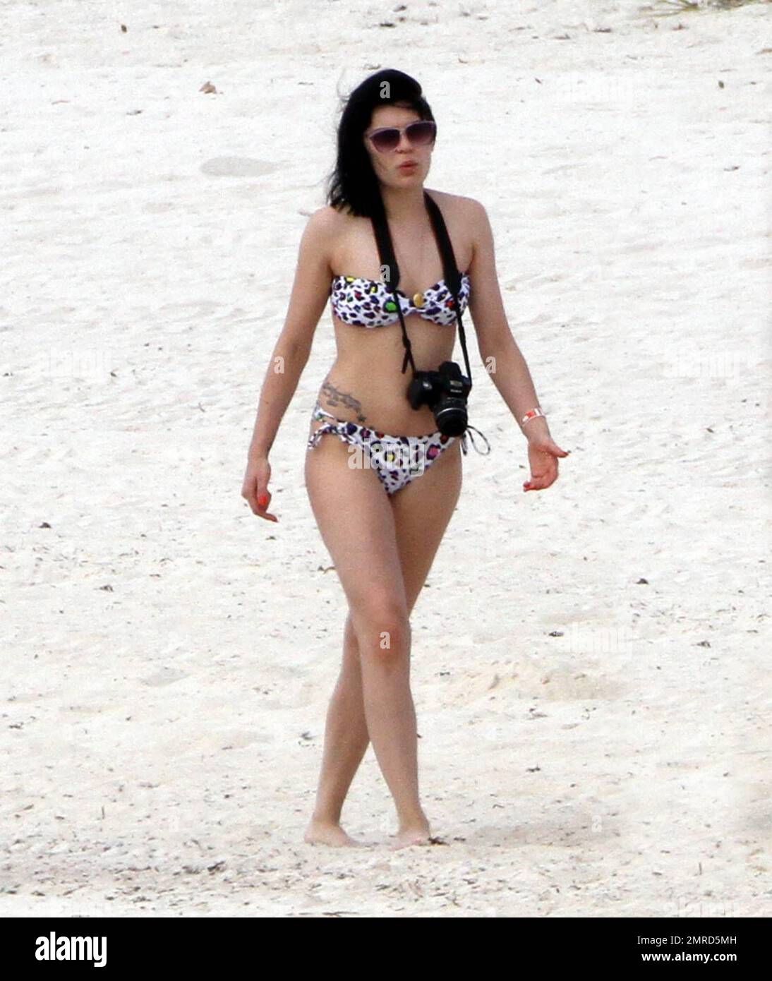 EXCLUSIVE!! British singer Jessie J reveals her incredible bikini body and tattoos during a ...