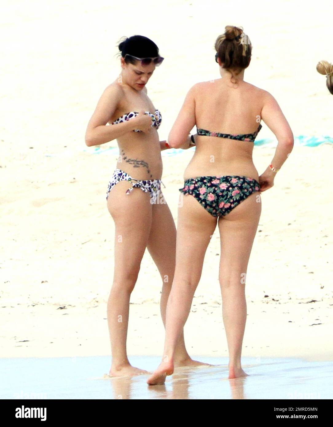 EXCLUSIVE!! British singer Jessie J reveals her incredible bikini body and tattoos during a ...