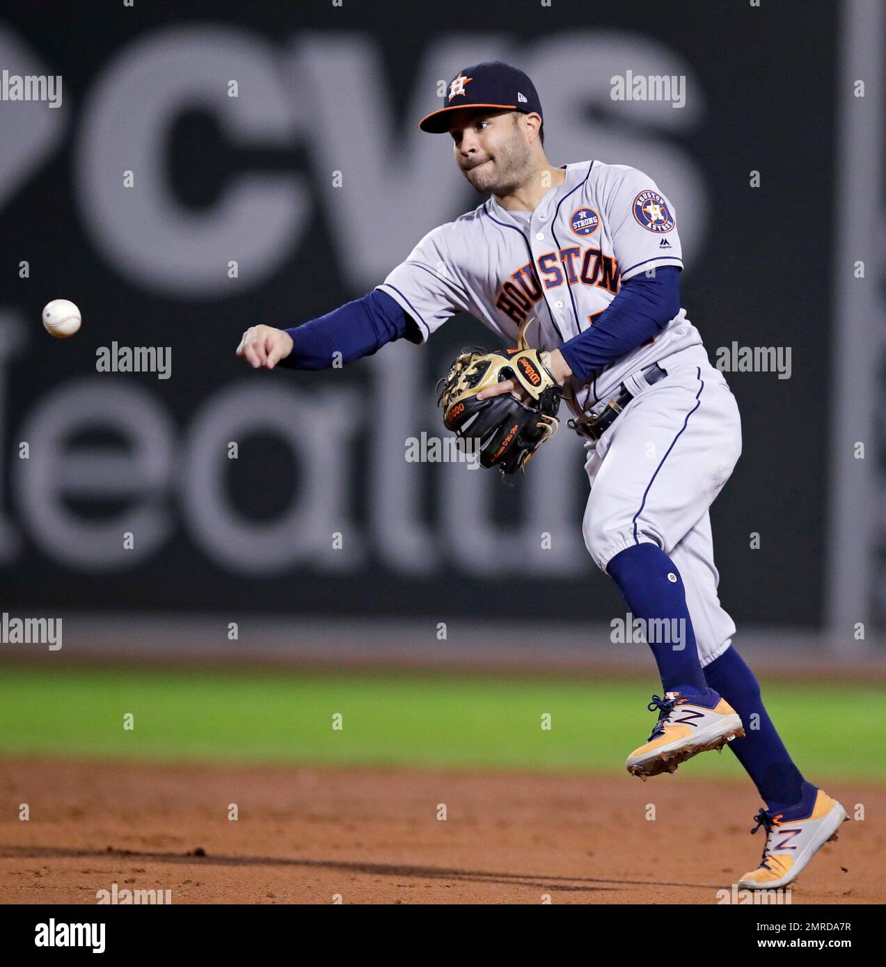 Houston Astros second baseman Jose Altuve fields and throws out Boston ...
