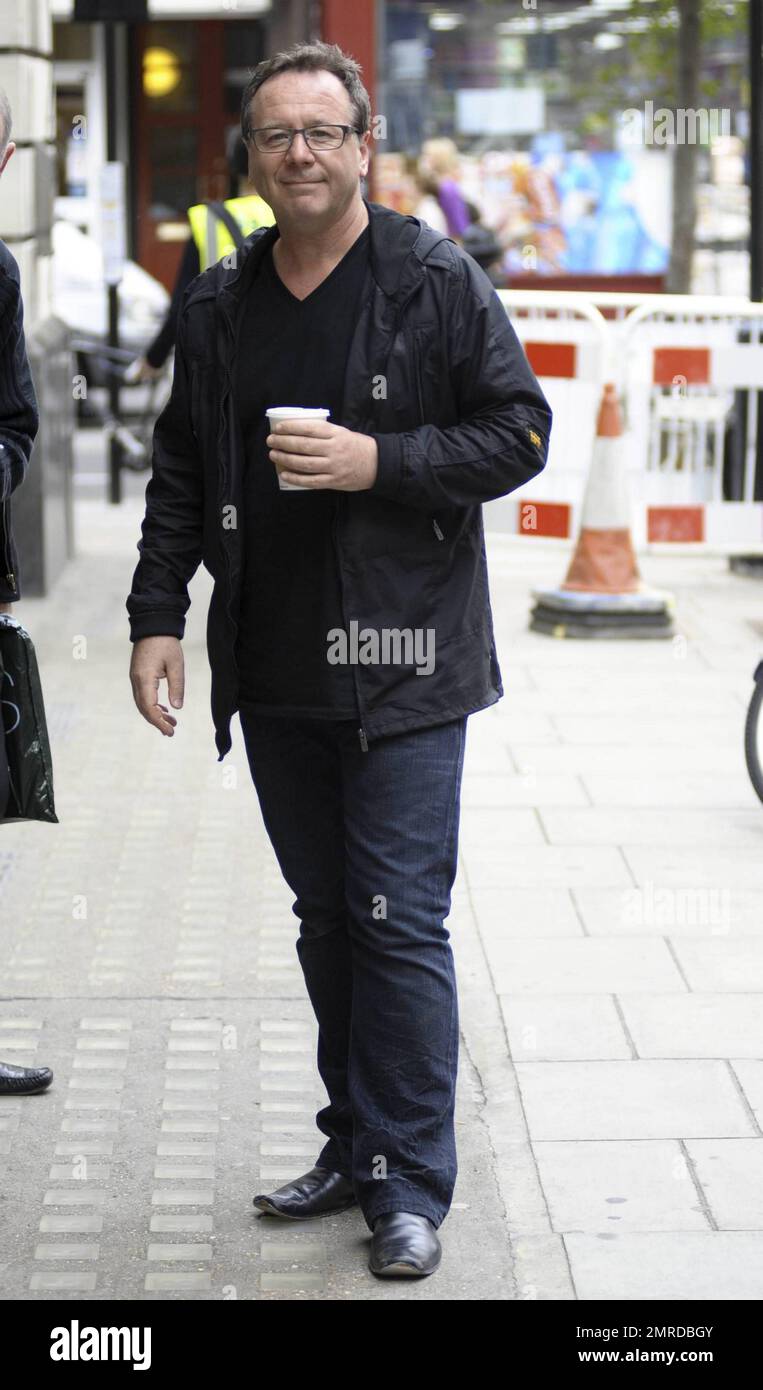 Simple Minds frontman Jim Kerr enjoys a coffee outside BBC Radio 2 ...