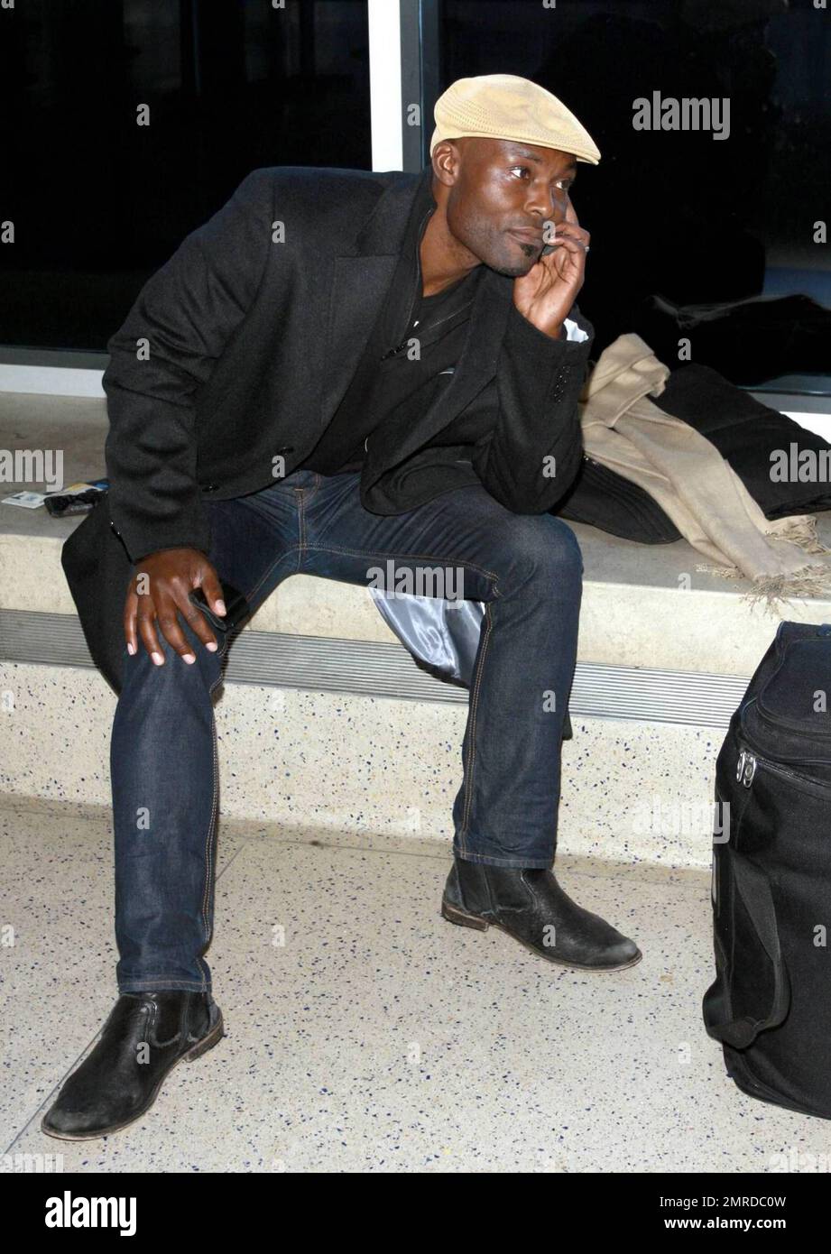 EXCLUSIVE!! Actor Jimmy Jean-Louis poses for photos before catching an ...