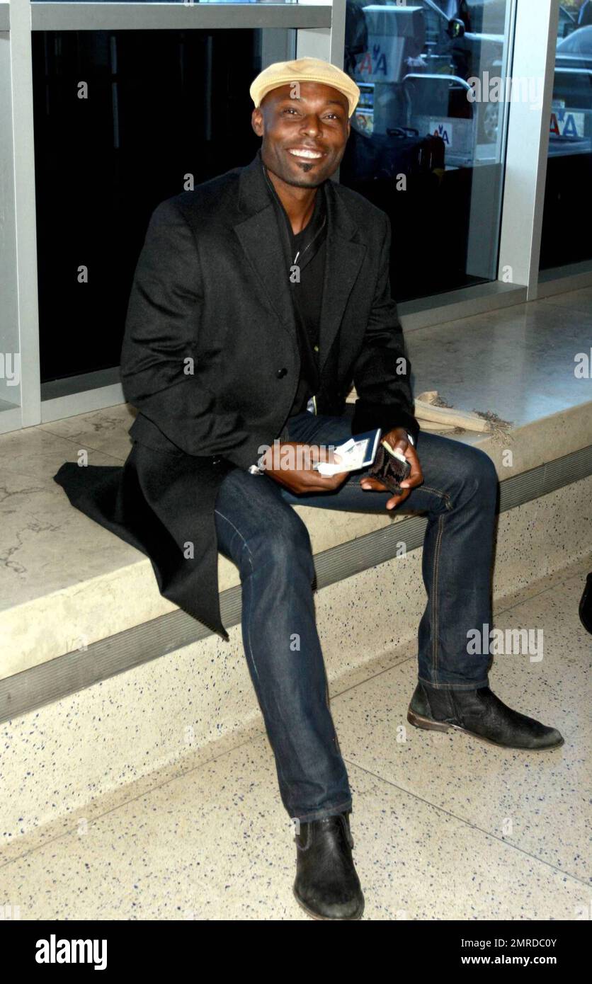 EXCLUSIVE!! Actor Jimmy Jean-Louis poses for photos before catching an ...