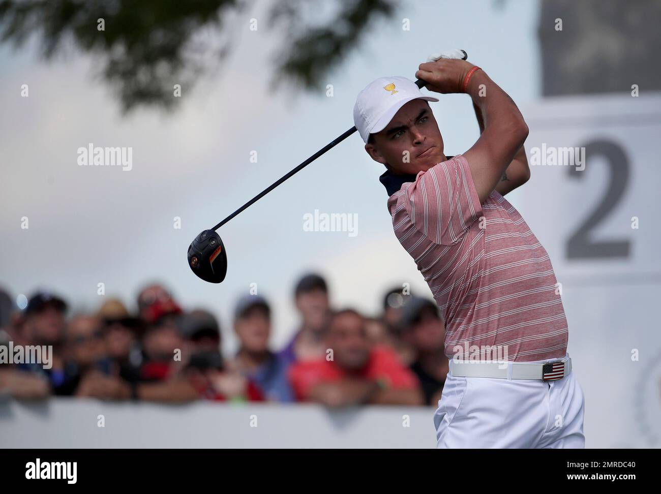 Rickie Fowler hits from the second tee during the four-ball golf ...