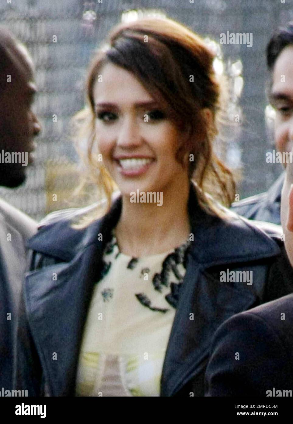 Jessica Alba waves to waiting fans as she arrives at the "Jimmy Kimmel ...