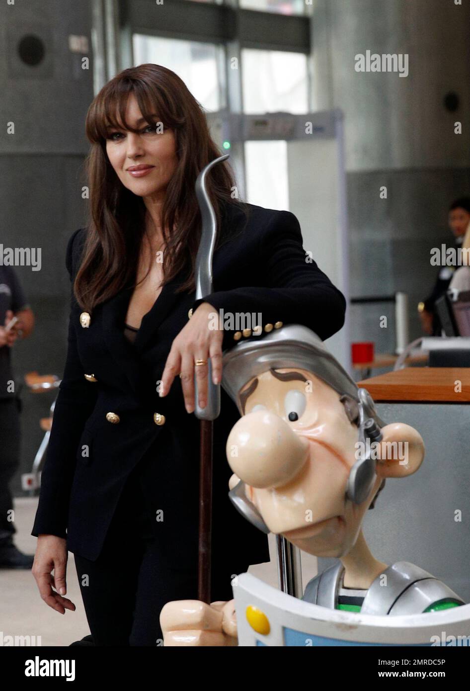 French actress Monica Bellucci poses for photographers next to Asterix ...