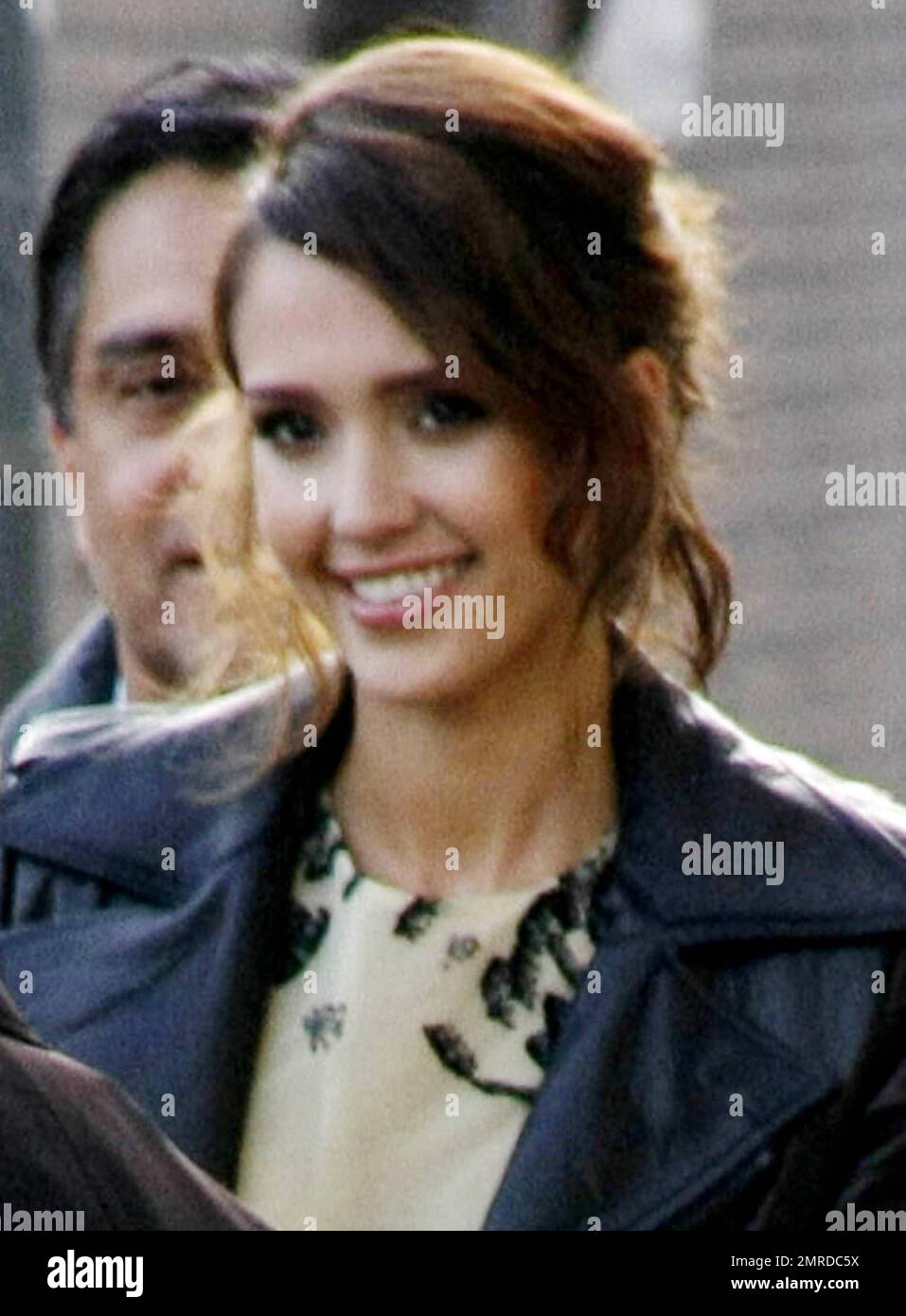 Jessica Alba waves to waiting fans as she arrives at the "Jimmy Kimmel ...