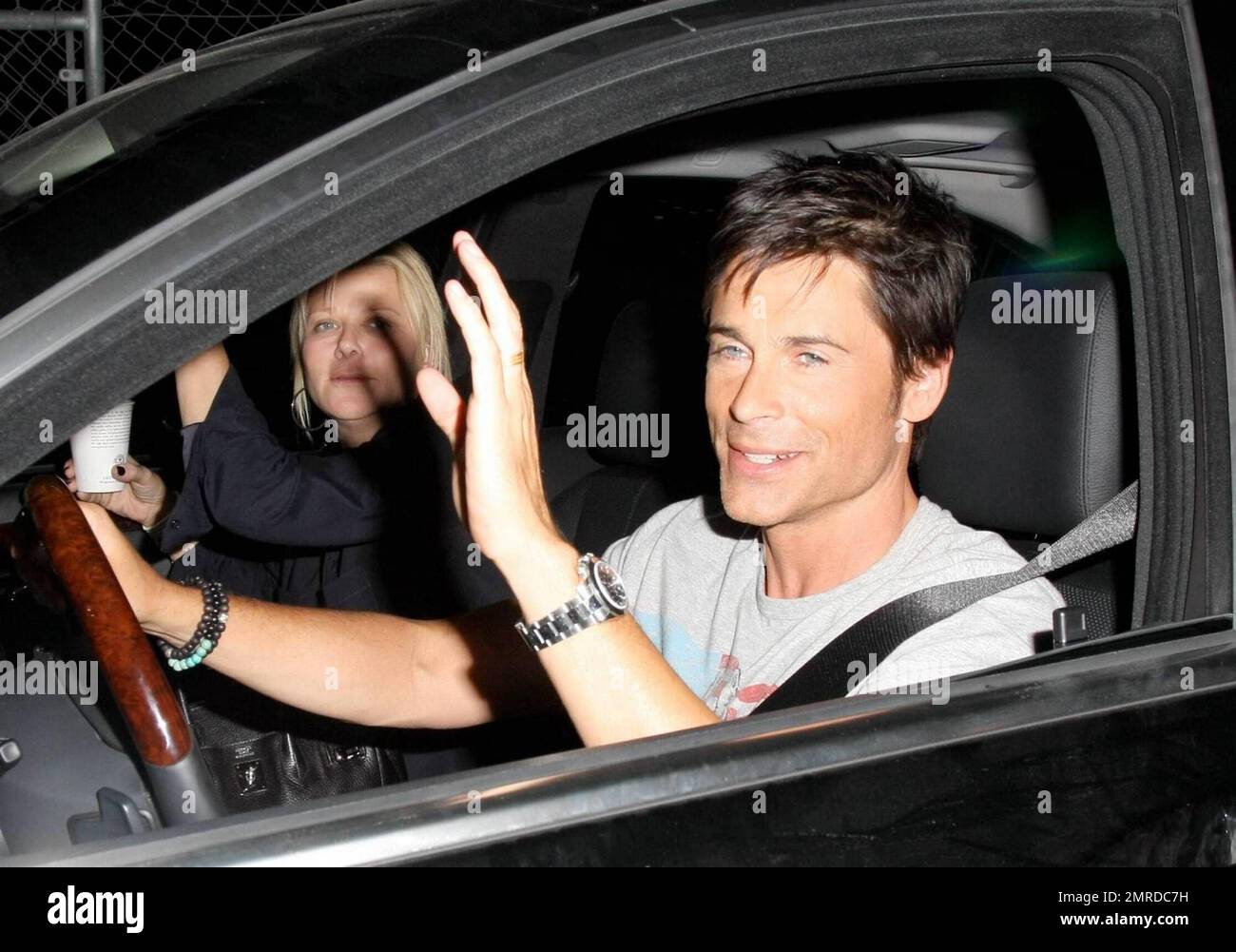 Rob Lowe signs autographs for fans while leaving the Jimmy Kimmel Show ...