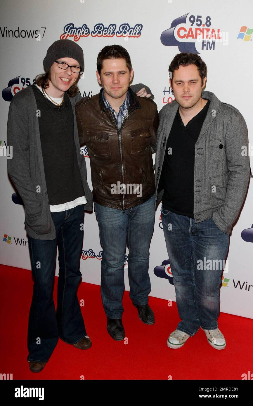 Greg Churchouse, Roy Stride and Pete Ellard of Scouting for Girls walk ...