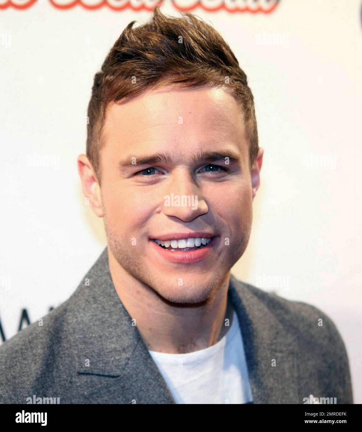 English singer songwriter Olly Murs poses on the red carpet during the ...