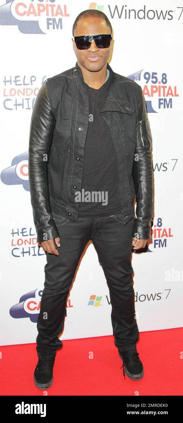 Taio Cruz poses on the red carpet during the Capital FM Jingle Bell ...