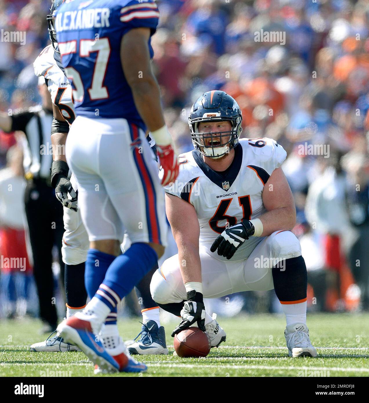 Denver Broncos center Matt Paradis (61) surveys the defense during the ...
