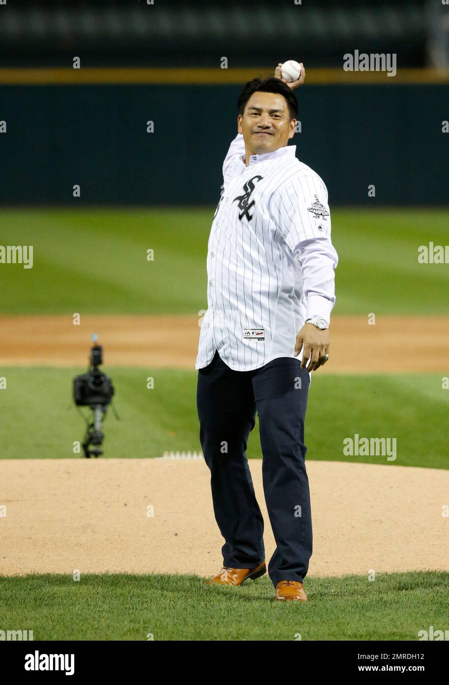 Former Chicago White Sox second baseman Tadahito Iguchi throws out a ...