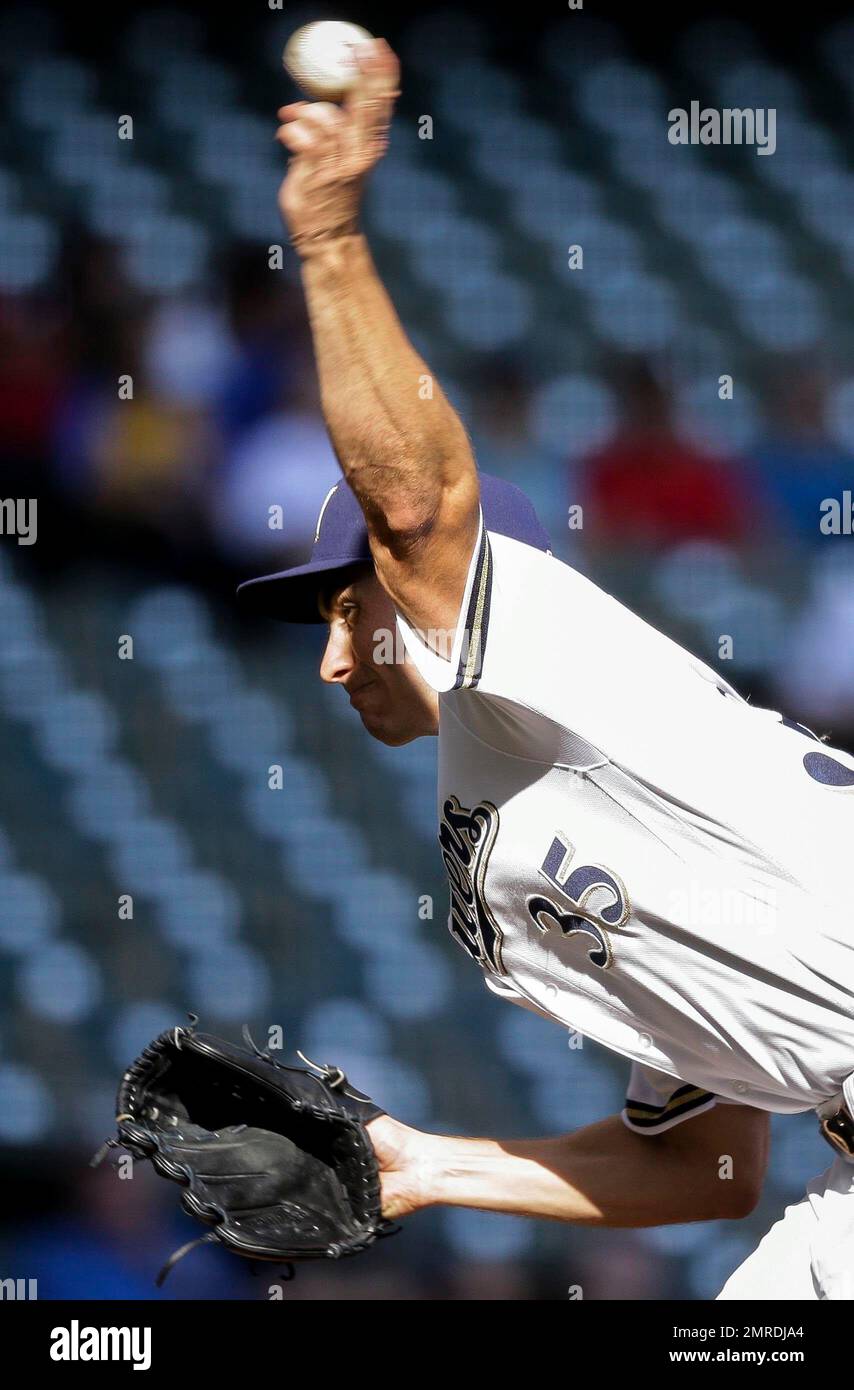 Milwaukee Brewers' Brent Suter pitches to a Cincinnati Reds batter ...