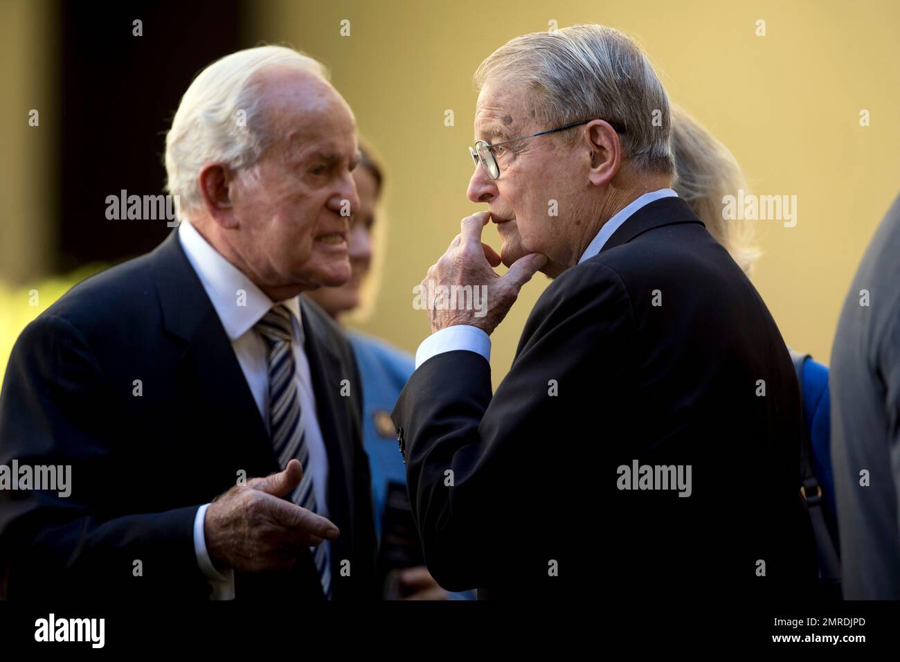 Former FBI Director William Webster, right, arrives for a ceremony for ...