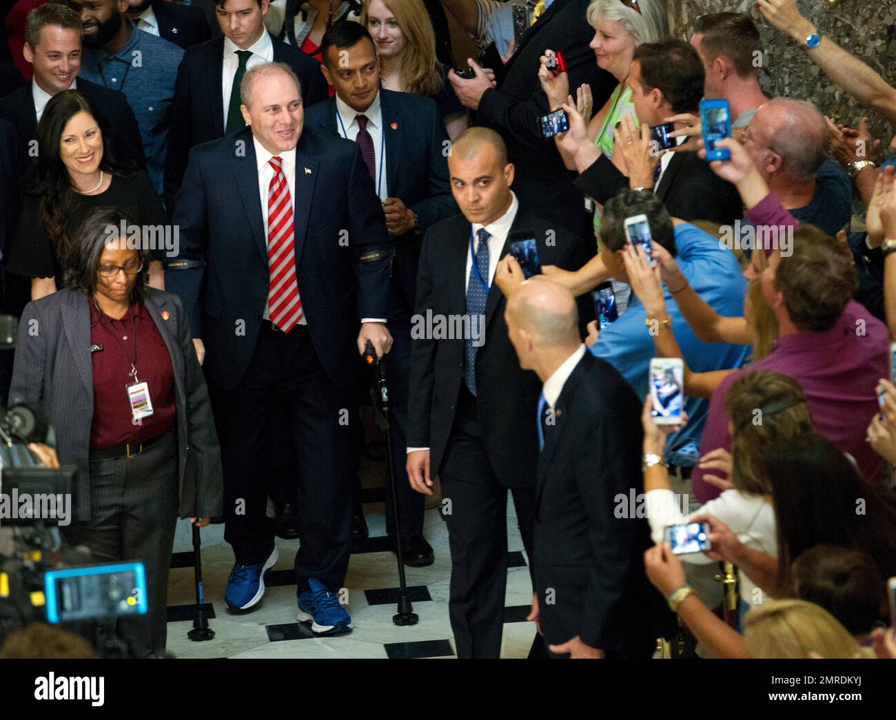 House Republican Whip Steve Scalise walks with his wife Jennifer, left ...