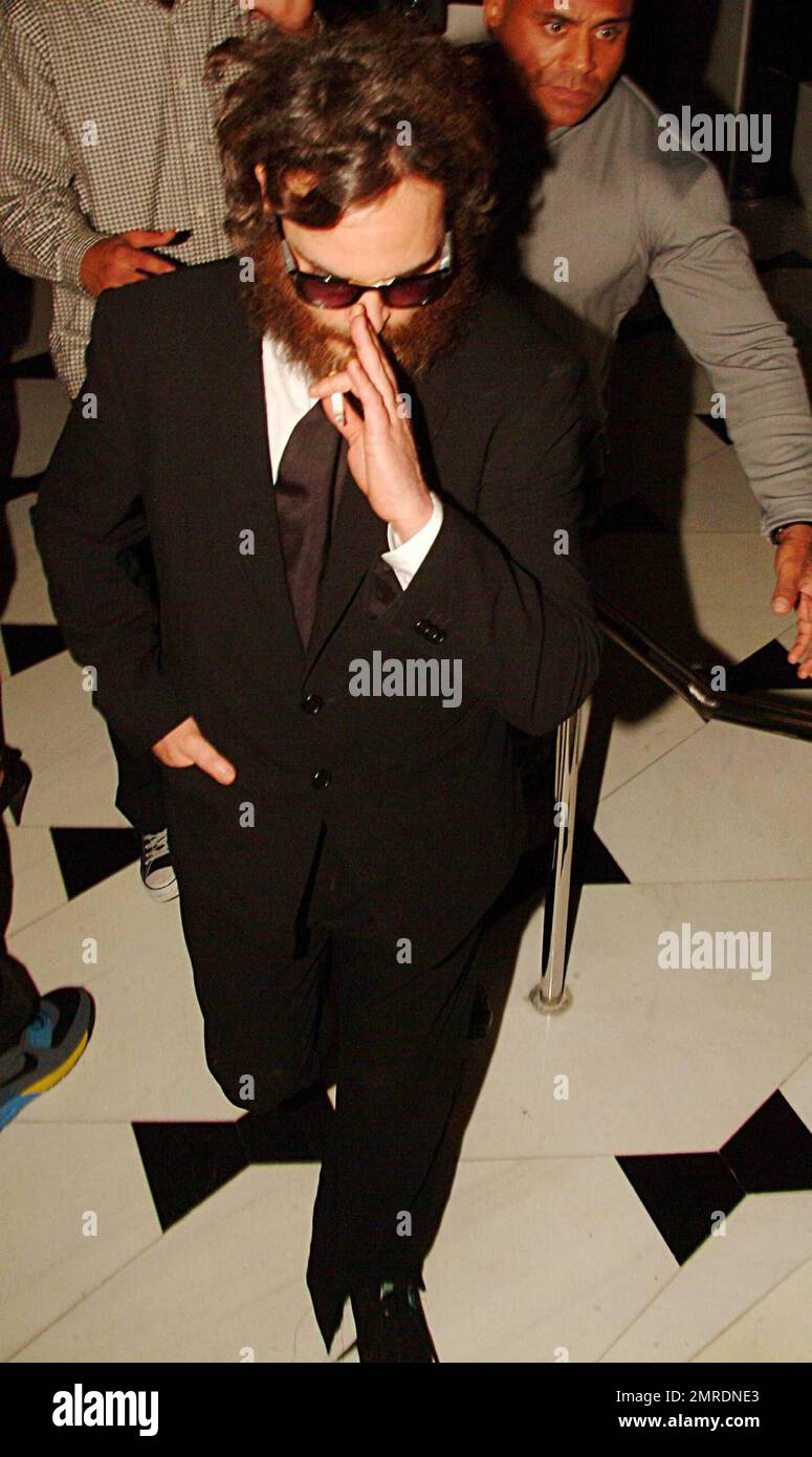 Exclusive!! Joaquin Phoenix arrives for a live performance that ended ...