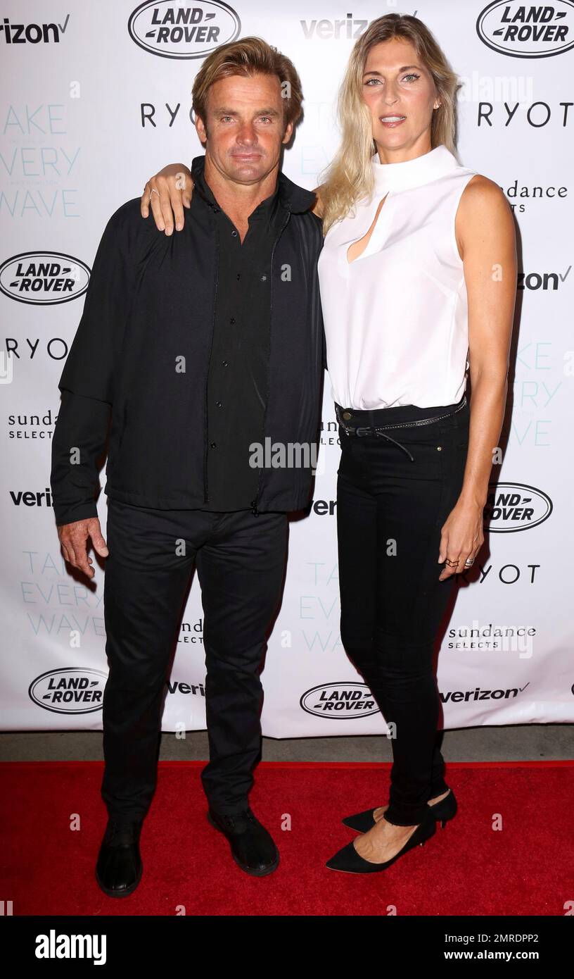 Laird Hamilton, left, and Gabrielle Reece arrive at the LA Premiere of ...