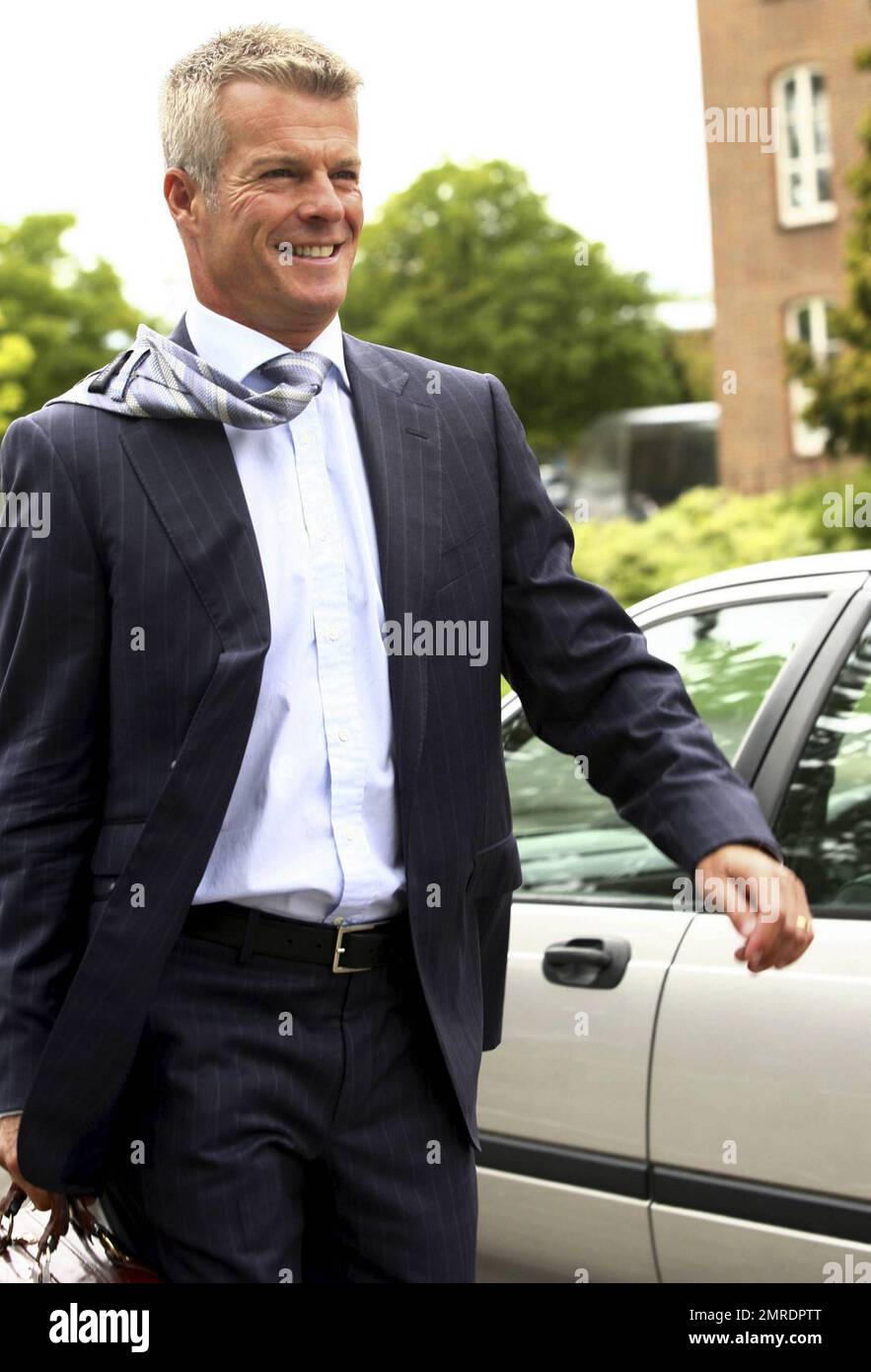 Liverpool midfielder Joe Cole's lawyer arrives for a sentencing hearing ...