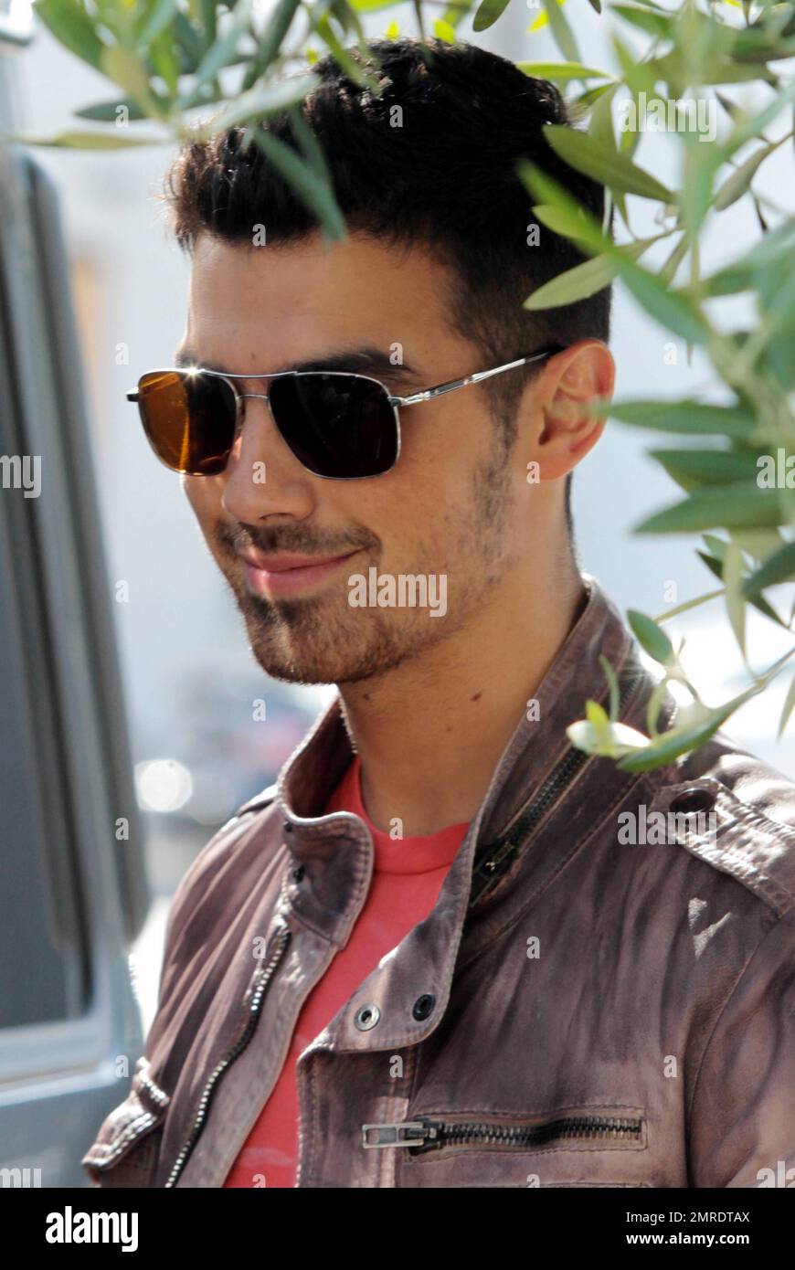 EXCLUSIVE!! Joe Jonas carries along a coffee drink as he leaves his ...